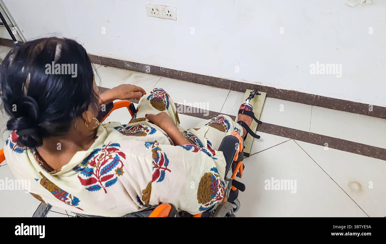 Disabled person performing foot rehabilitation hi-res stock photography ...