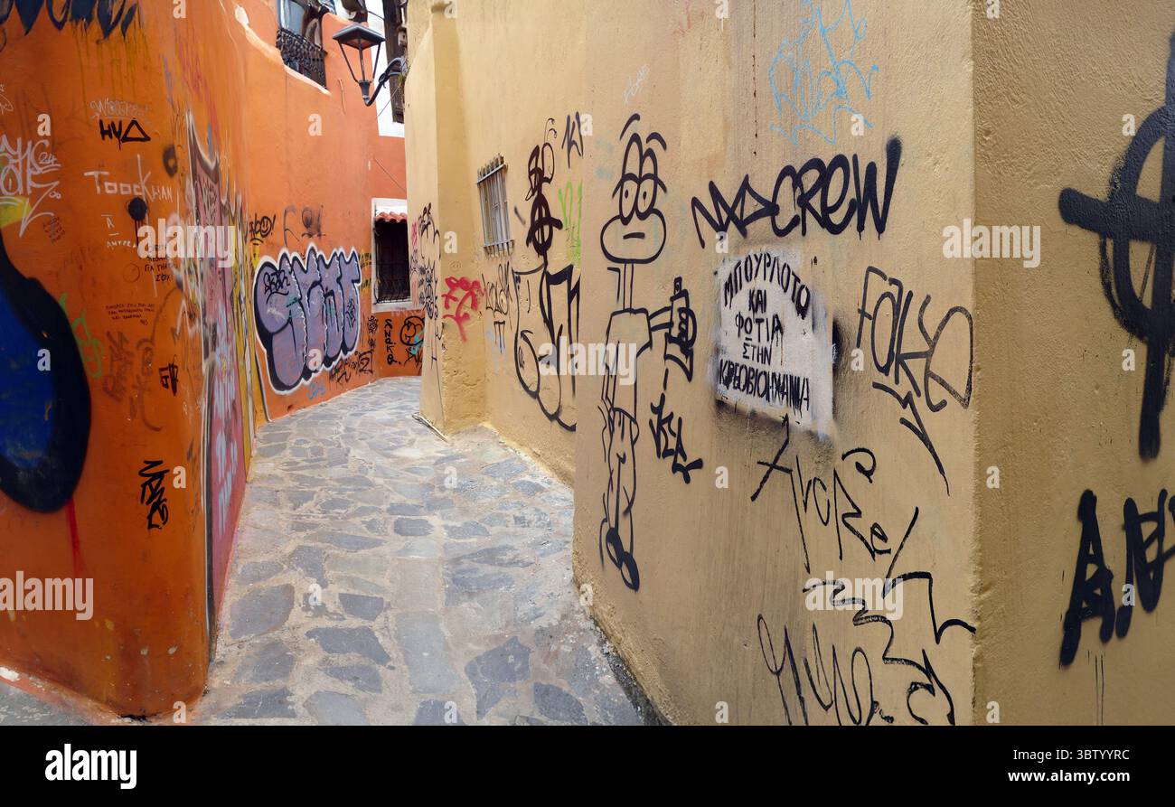 CHANIA, CRETE - MAY 5, 2025 - Urban concrete wall displaying colorful ...