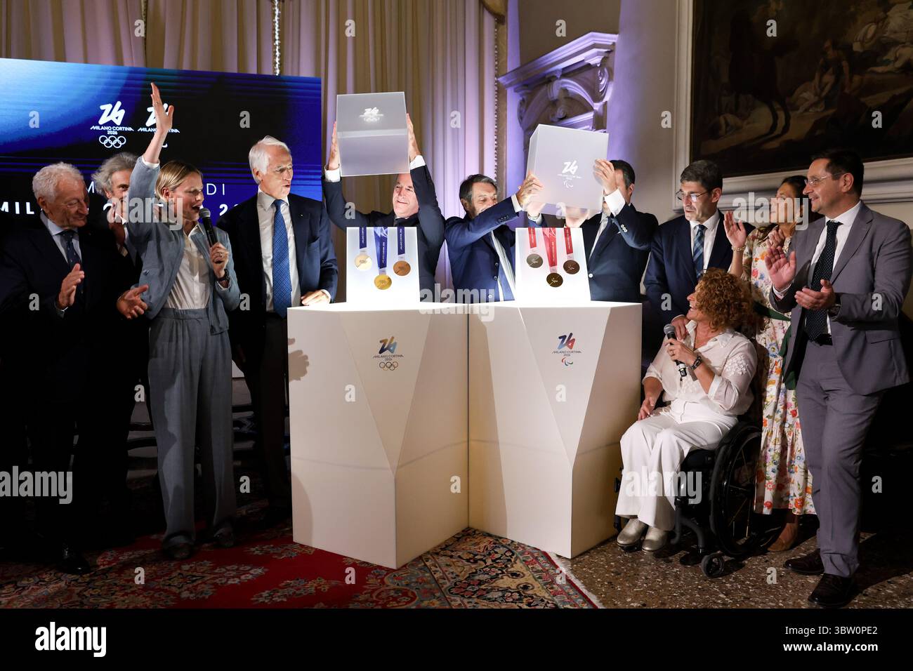 Venice, Italy. 15th July, 2025. Invited guests unveil the medals for ...