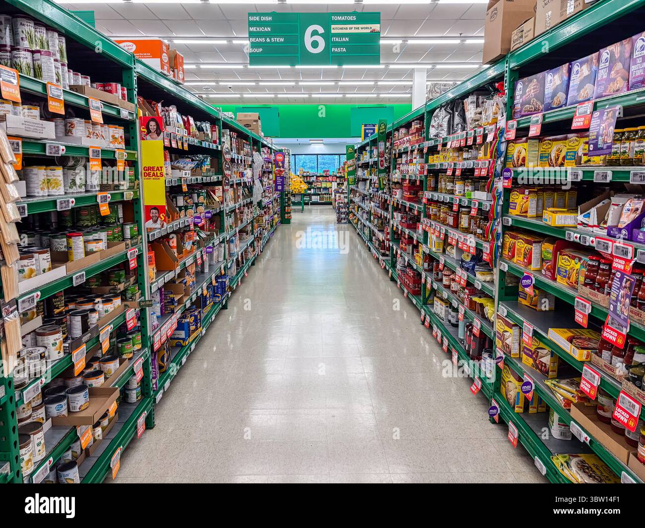 Inside a Food Basic grocery store, showing a long aisle lined with ...