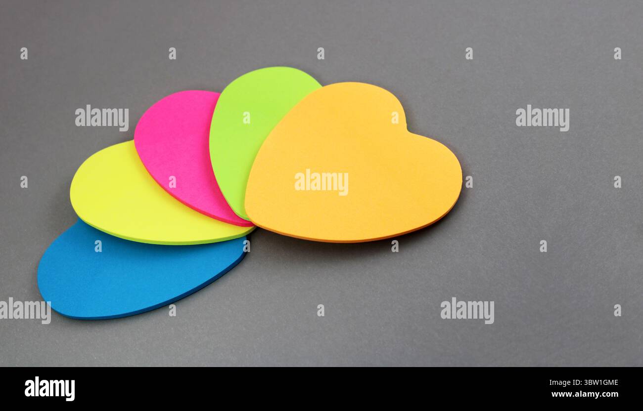 Colorful heart-shaped sticky notes forming a fan Stock Photo - Alamy