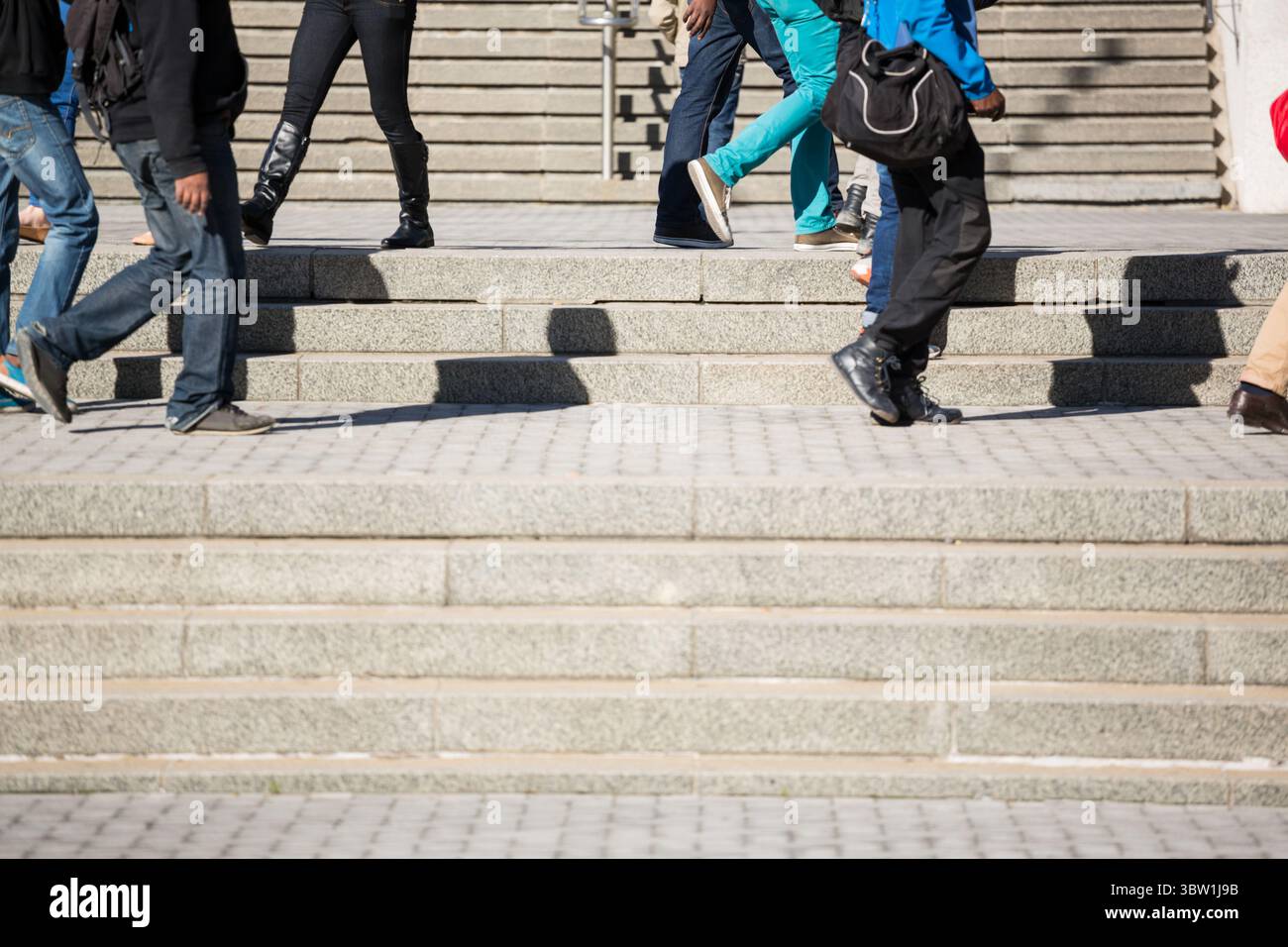 People walking on staircase hi-res stock photography and images - Alamy