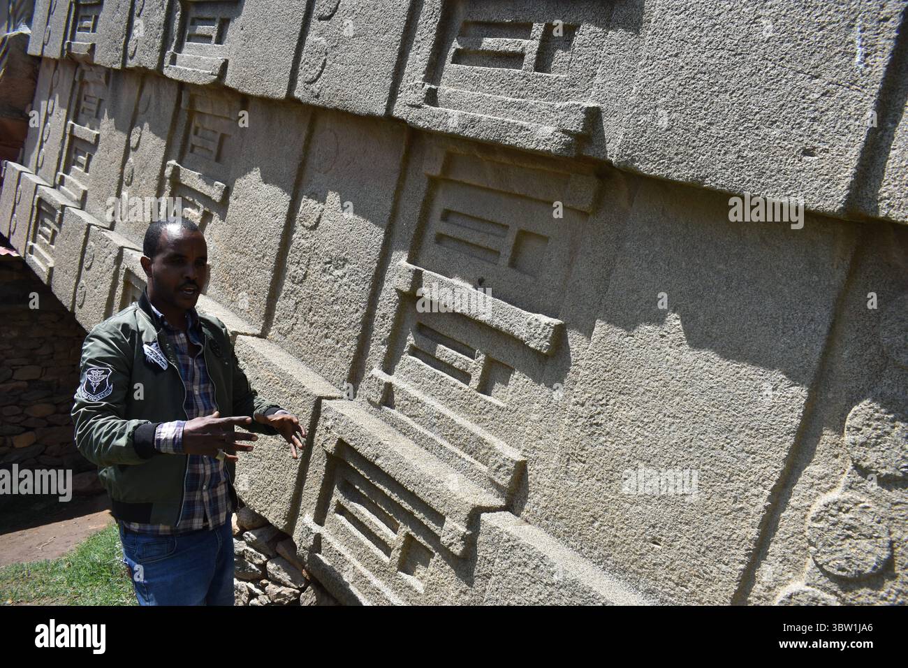 Black man suggestering with hands hi-res stock photography and images ...