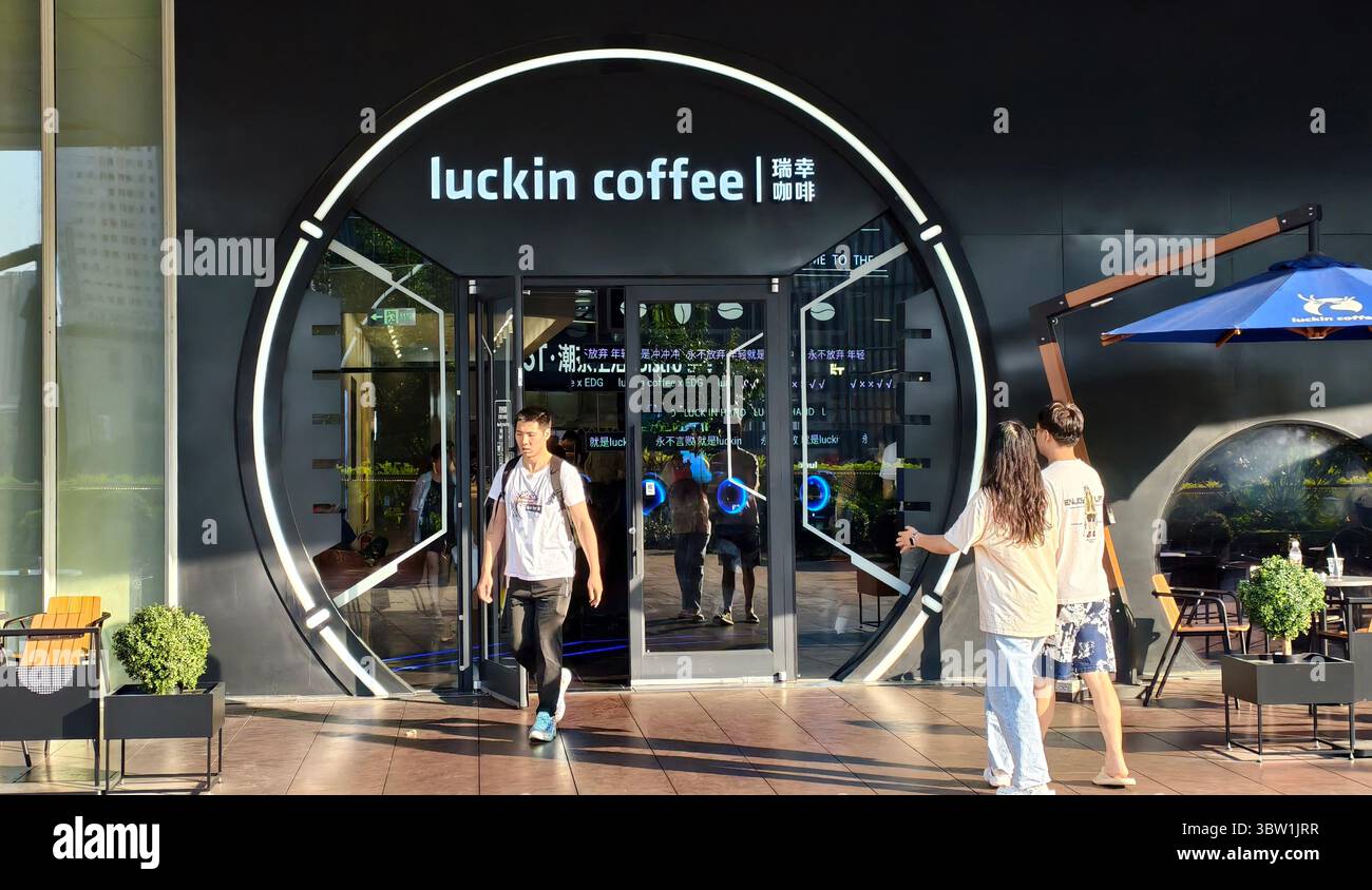 Shanghai, China. 14th July, 2025. Luckin Coffee and e-sports club EDG ...