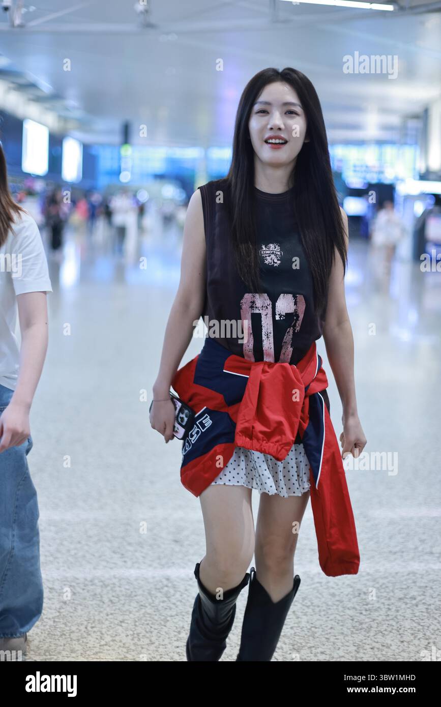 Chinese actress Cai Wenjing appears at the airport in Shanghai, China, 14 July, 2025 Stock Photo ...