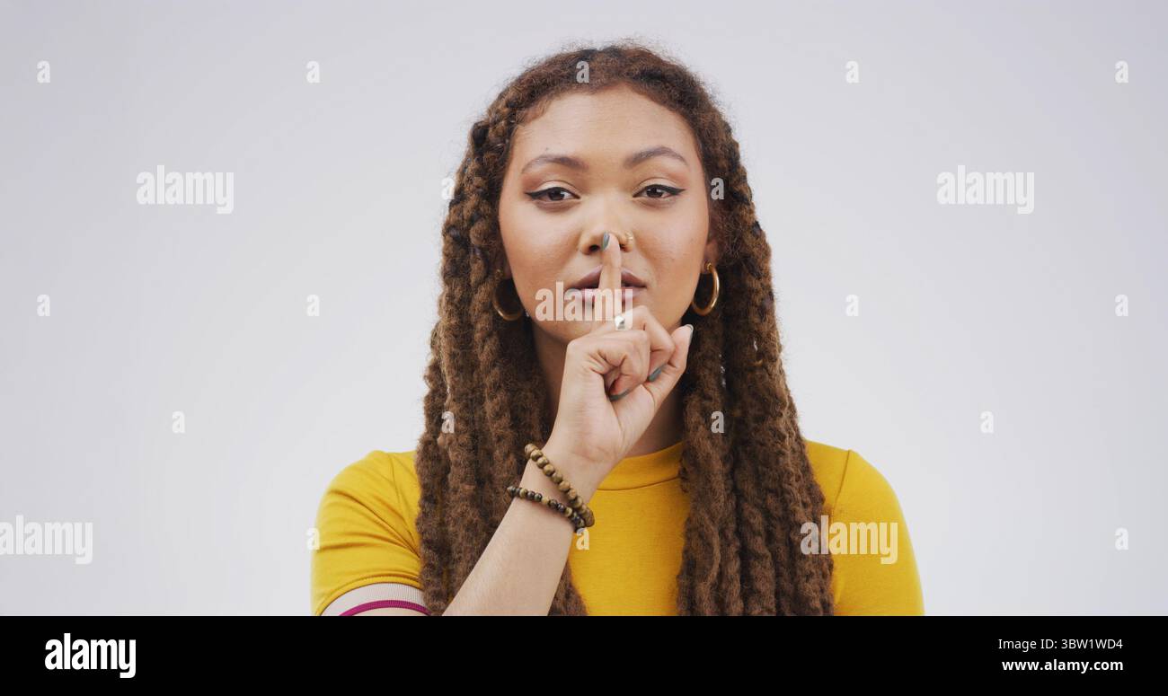Portrait, finger on lips and woman with secret, whisper and privacy ...