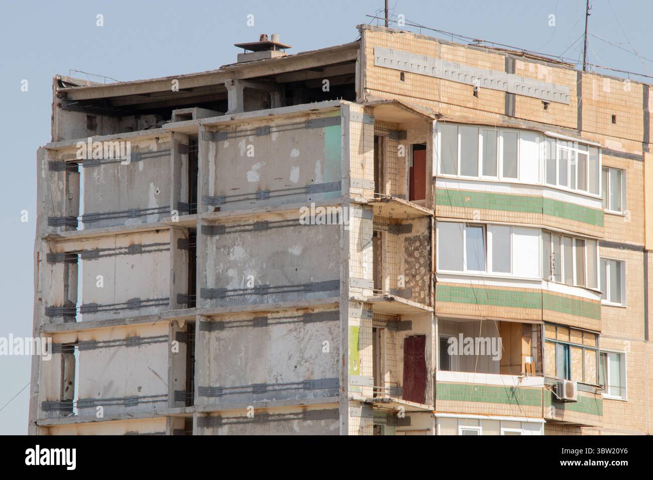 Damaged residential building after missile strike, destroyed part of ...