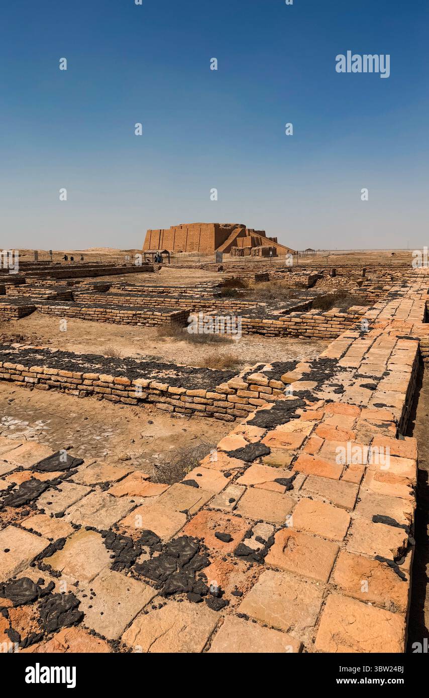 Visitors explore the Ziggurat of Ur, an ancient Sumerian site, admiring ...
