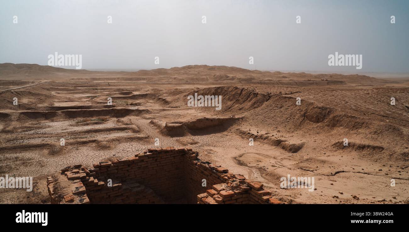 Ruins of Uruk are visible across the arid landscape, showcasing an ...
