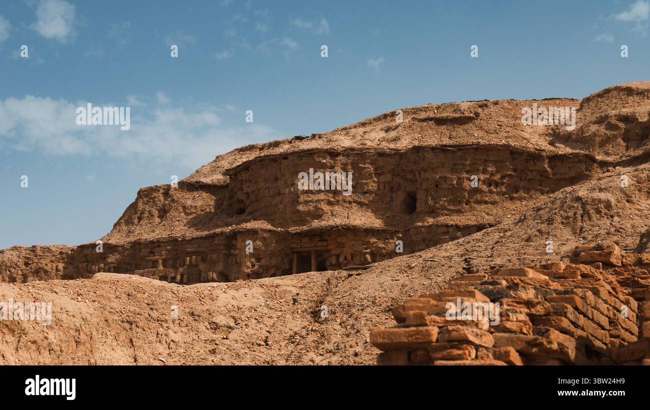 Historic remains of ancient structures tower over the dry landscape of ...