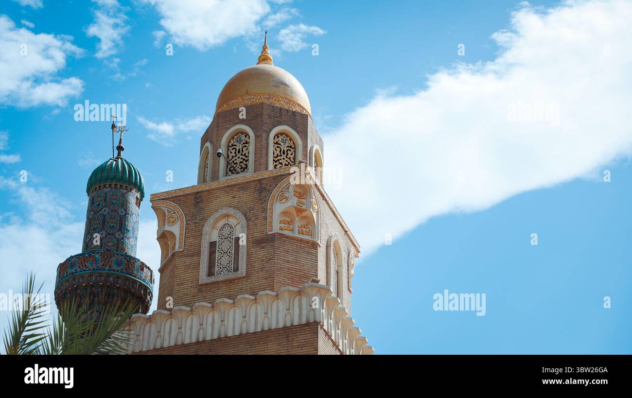 A clear sky highlights the stunning architecture of Kufa, Iraq Stock ...