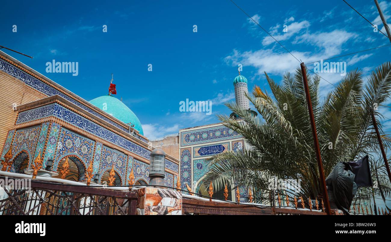 Visitors admire the stunning Al Mukhtar Shrine in Kufa, Iraq, featuring ...