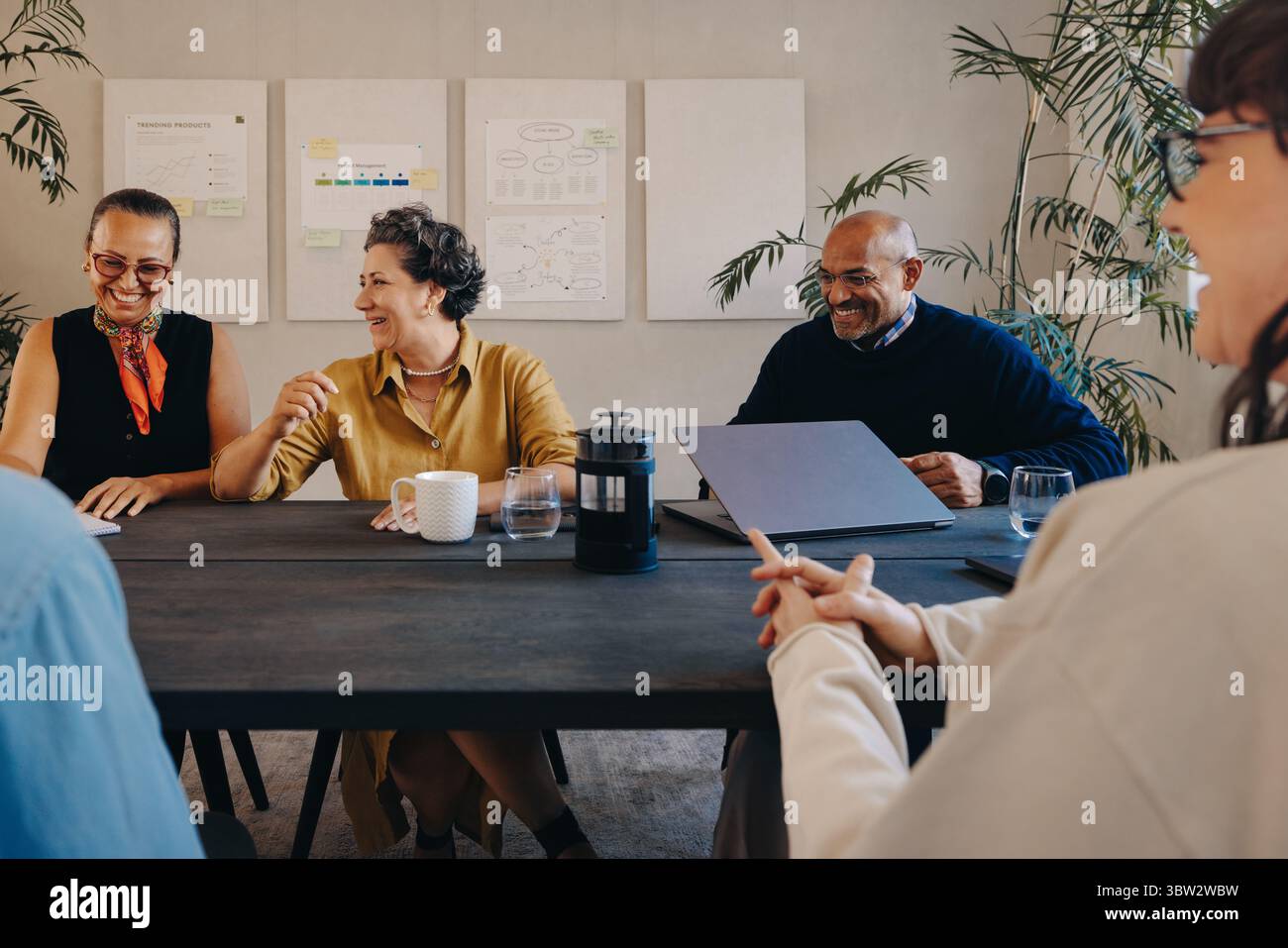 Team members discussing strategies hi-res stock photography and images ...