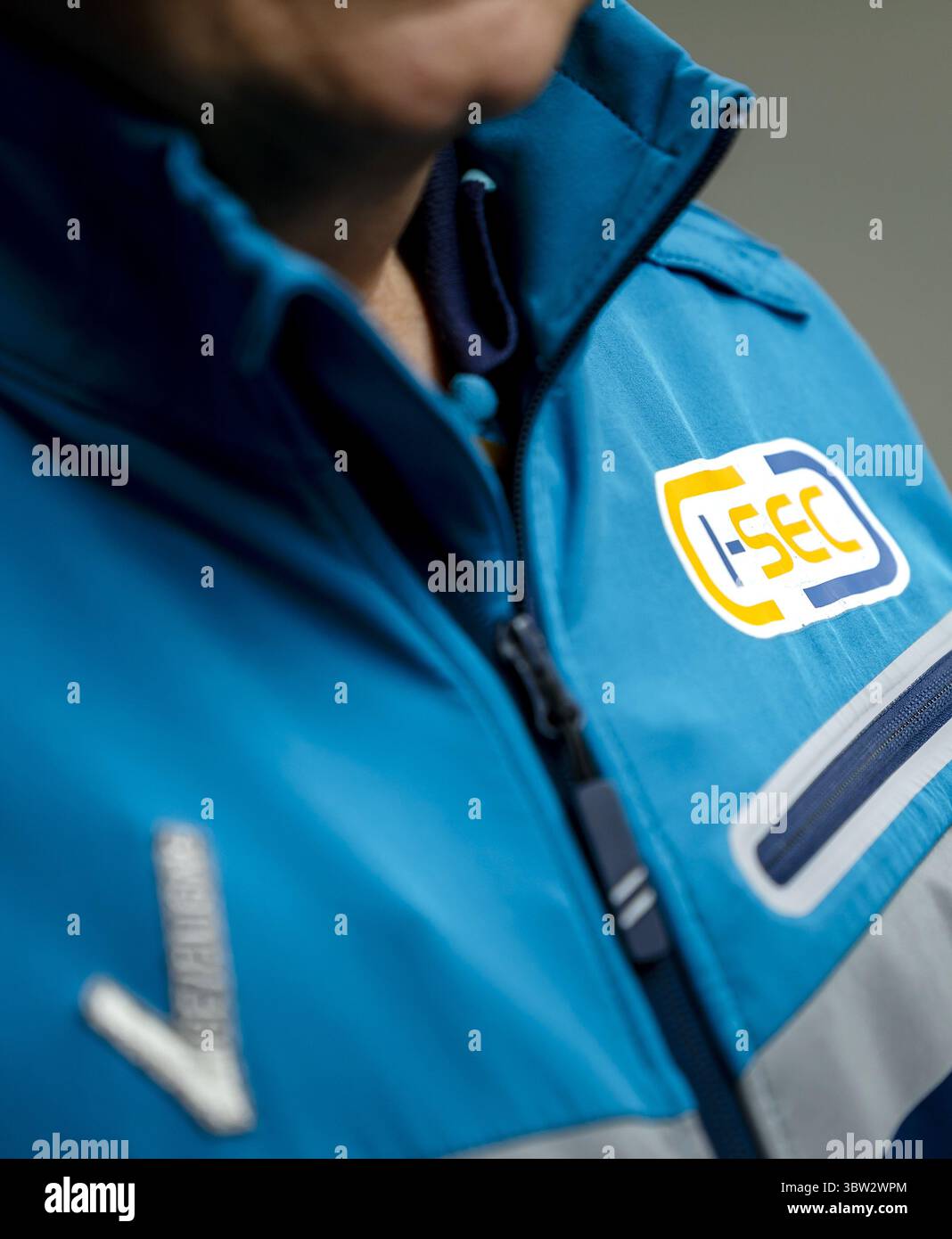 SCHIPHOL - A security guard from the company I-Sec at Schiphol Airport ...