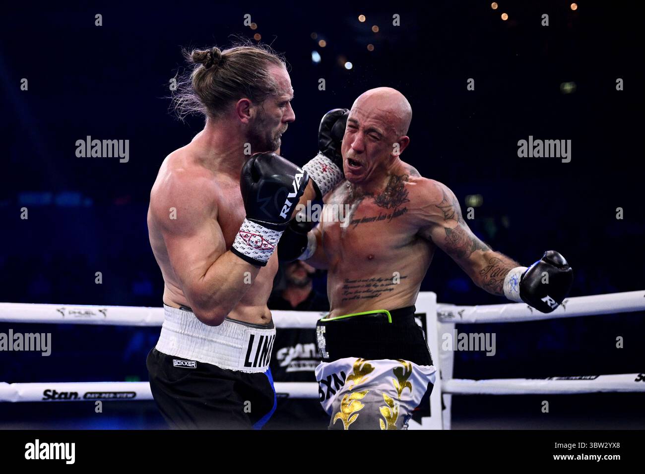 Kane Baker (right) and Johan Linde during their undercard bout ahead of ...