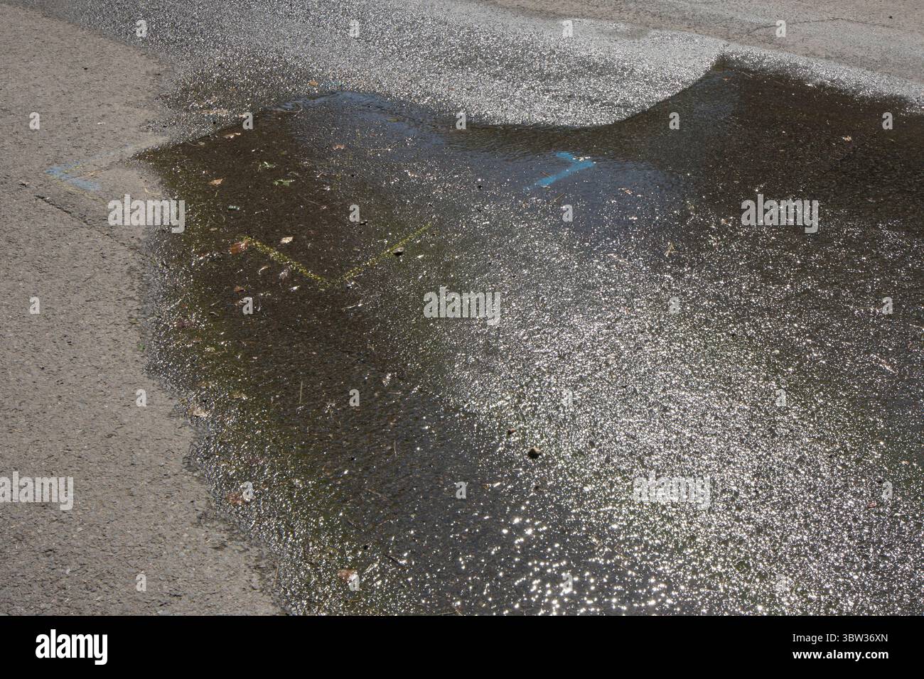 leaking water pipes, burst mains, water running down the road, Water ...