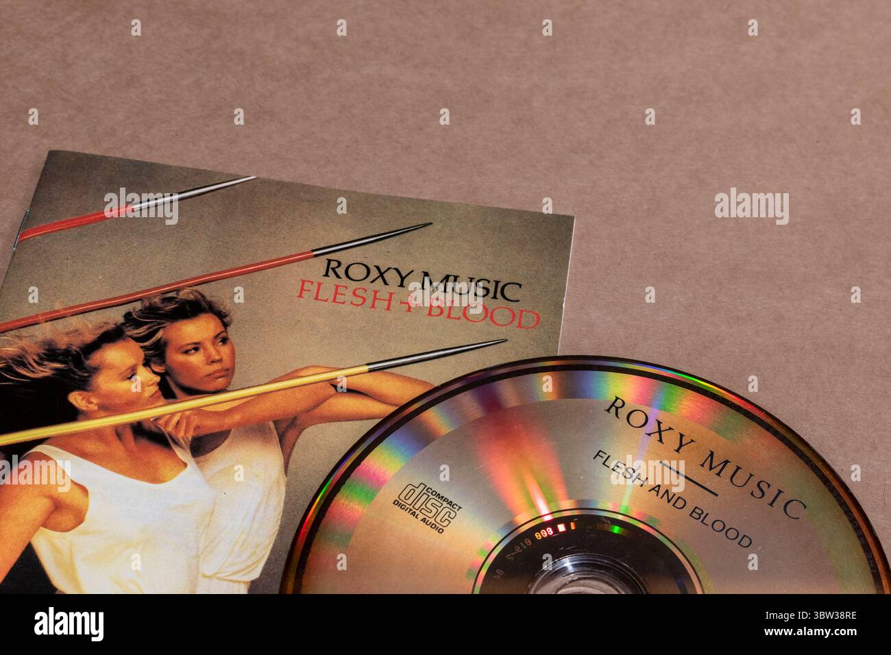 Roxy Music 'Flesh and Blood' CD cover and disc, isolated on a light ...
