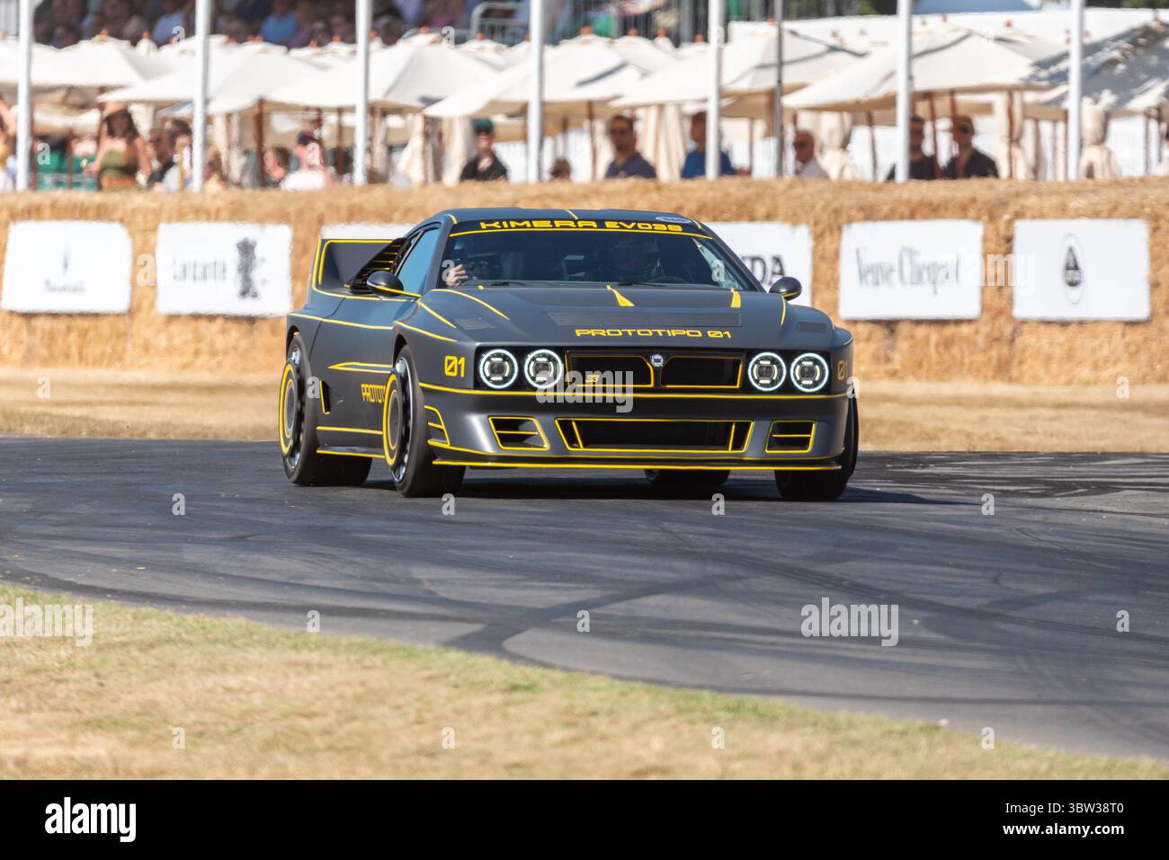 Kimera Evo 38 car driving up the hillclimb track at the Goodwood ...