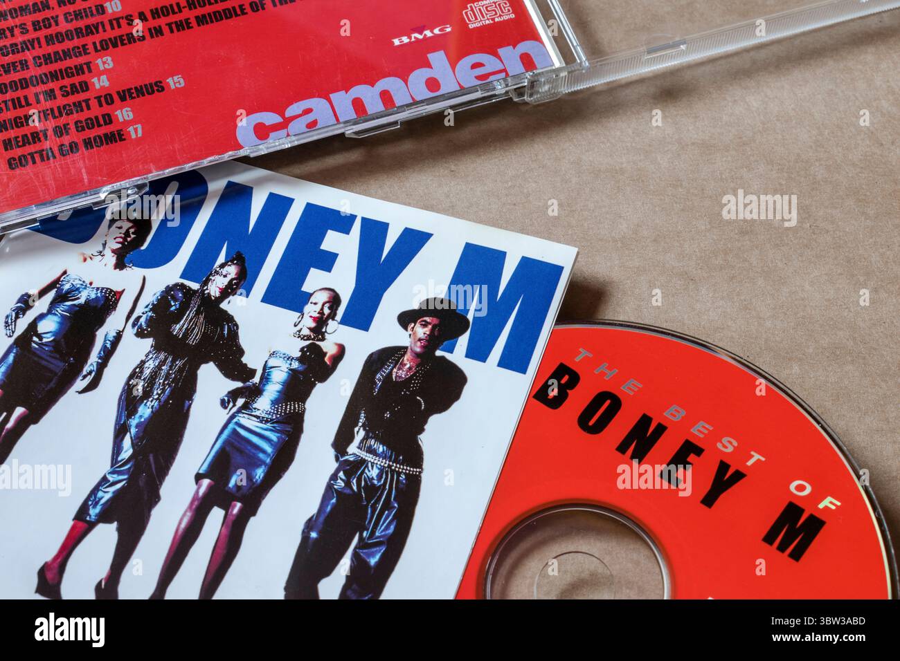 CD and album cover of 'The Best of Boney M' isolated on a light ...