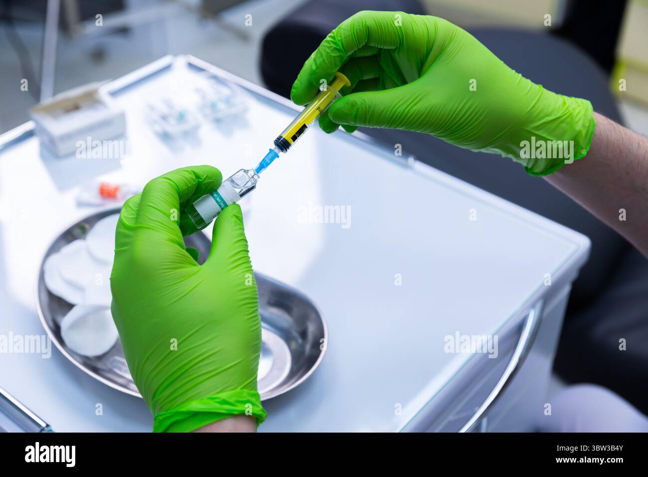 Healthcare Professional Preparing Vaccine Injection in a Clinical ...