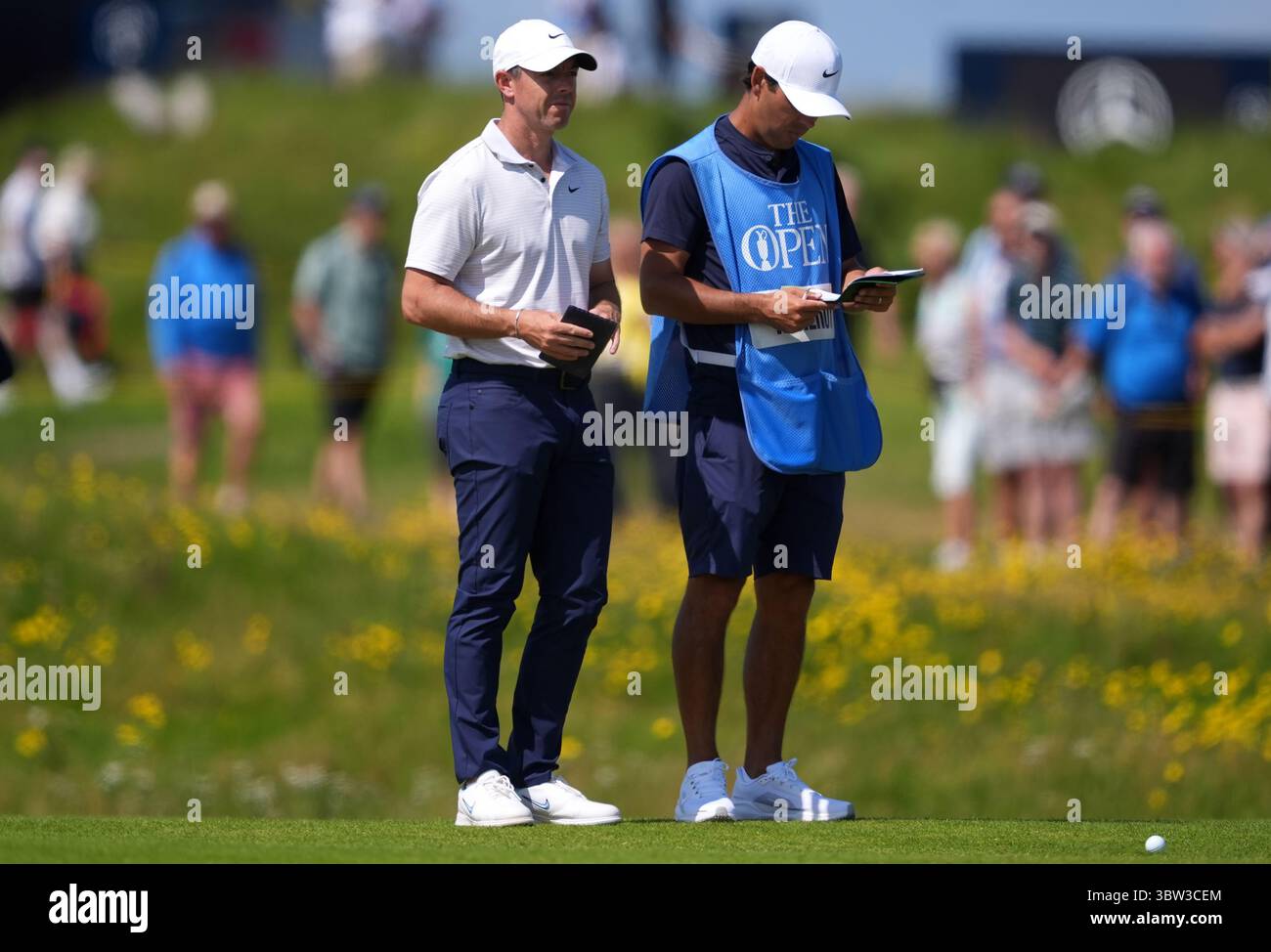 Northern Ireland's Rory McIlroyand caddy Harry Diamond on the 2nd ...