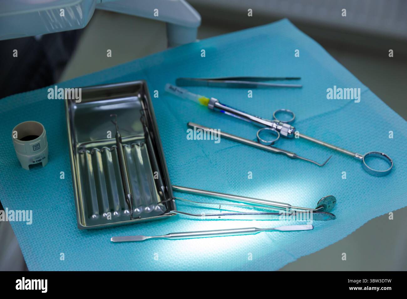 A Detailed Look at Surgical Instruments on a Blue Tray in a Clinical ...