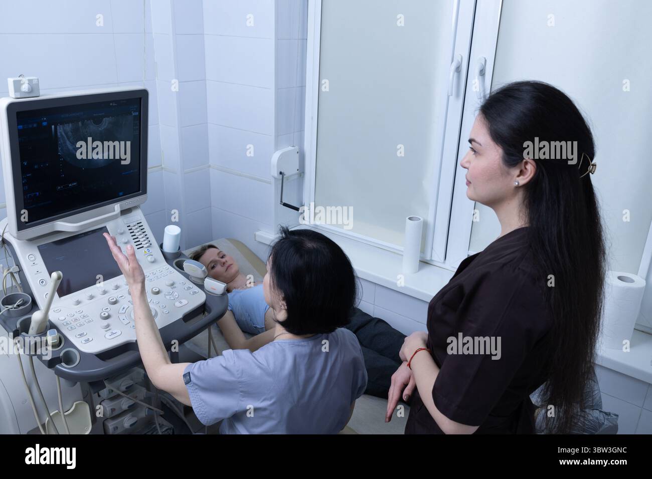 Medical Ultrasound Examination in Progress with Caring Health ...