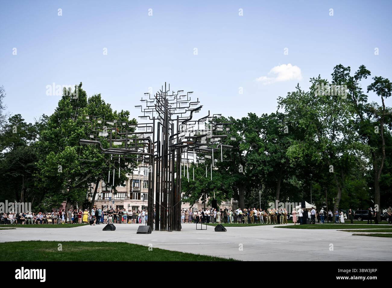 The Tree of Memory installation features symbolic tubes with the names ...