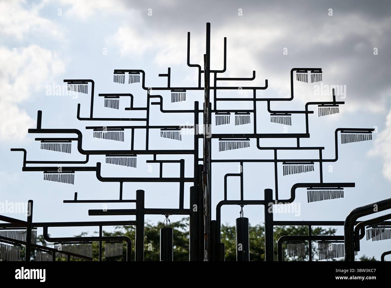 The Tree of Memory installation features symbolic tubes with the names ...