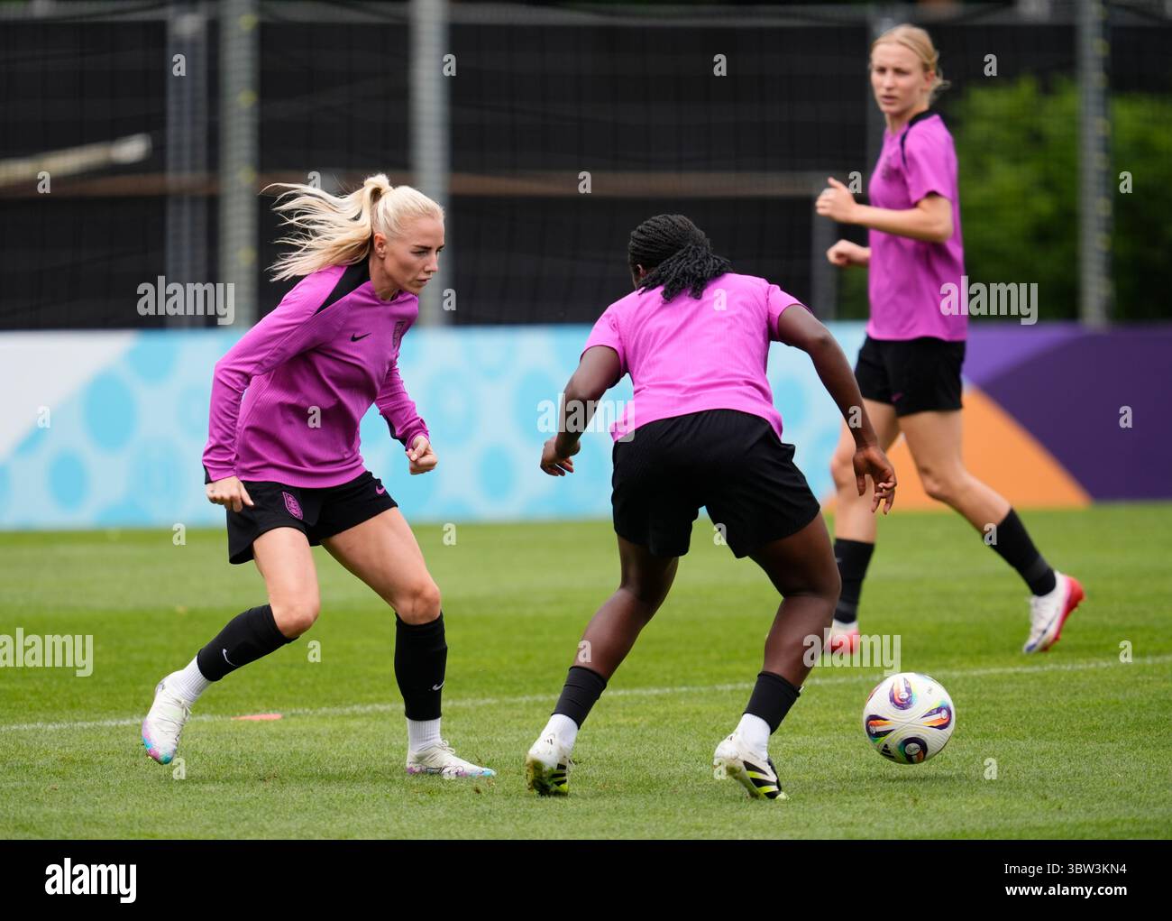 England's Alex Greenwood (left) and Michelle Agyemang during a training ...