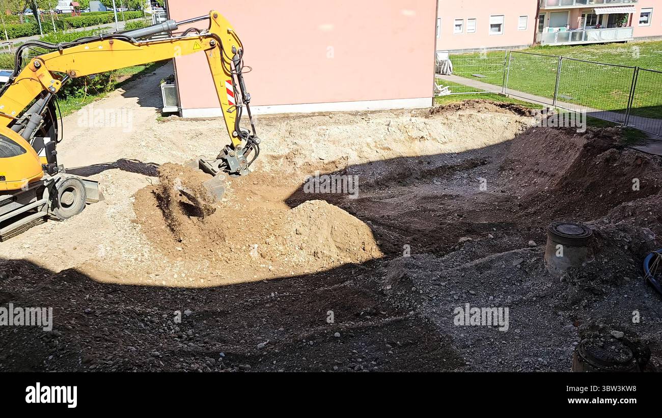 Excavator Digging Foundation: Construction Site, Earthworks. High ...