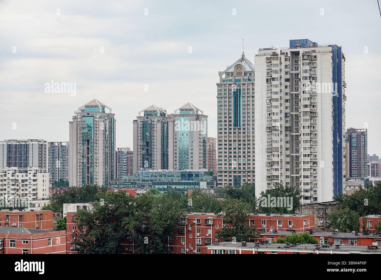 A cityscape of Beijing featuring tall buildings, including some with ...
