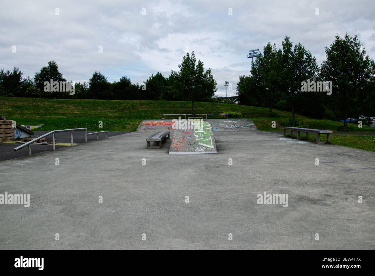 A skate park in Reykjavik, Iceland featuring ramps, rails, and graffiti ...