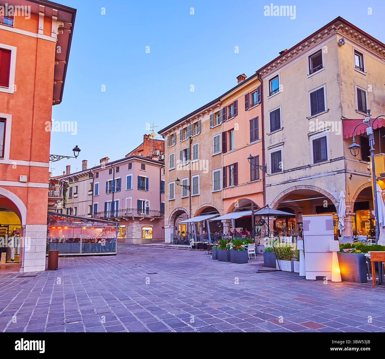 Piazza Giuseppe Malvezzi Square with terraces of outdoor restaurants ...
