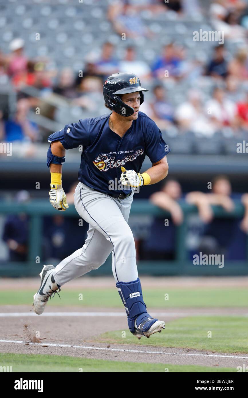 Montgomery Biscuits right fielder Colton Ledbetter (15) hustles to ...