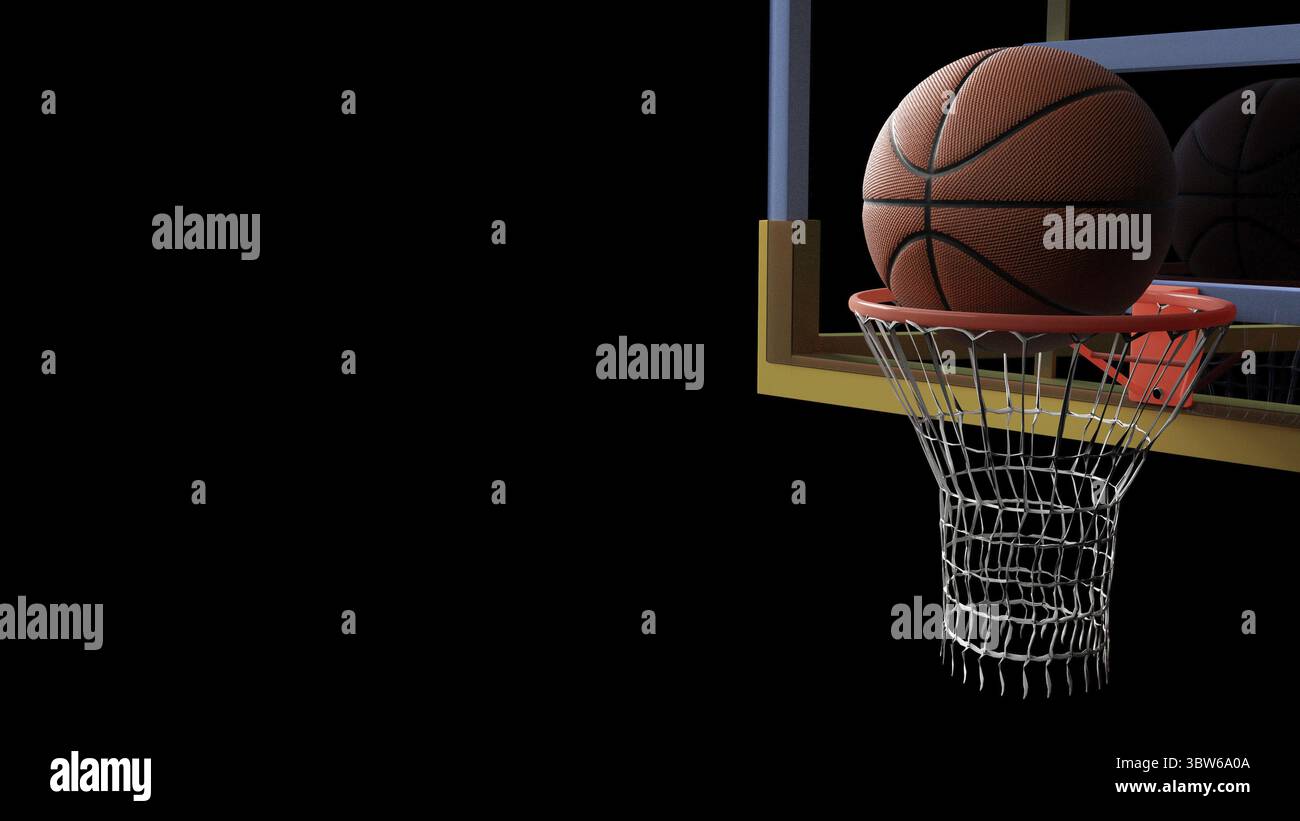 Basketball going into hoop on black isolated background. Sport and ...