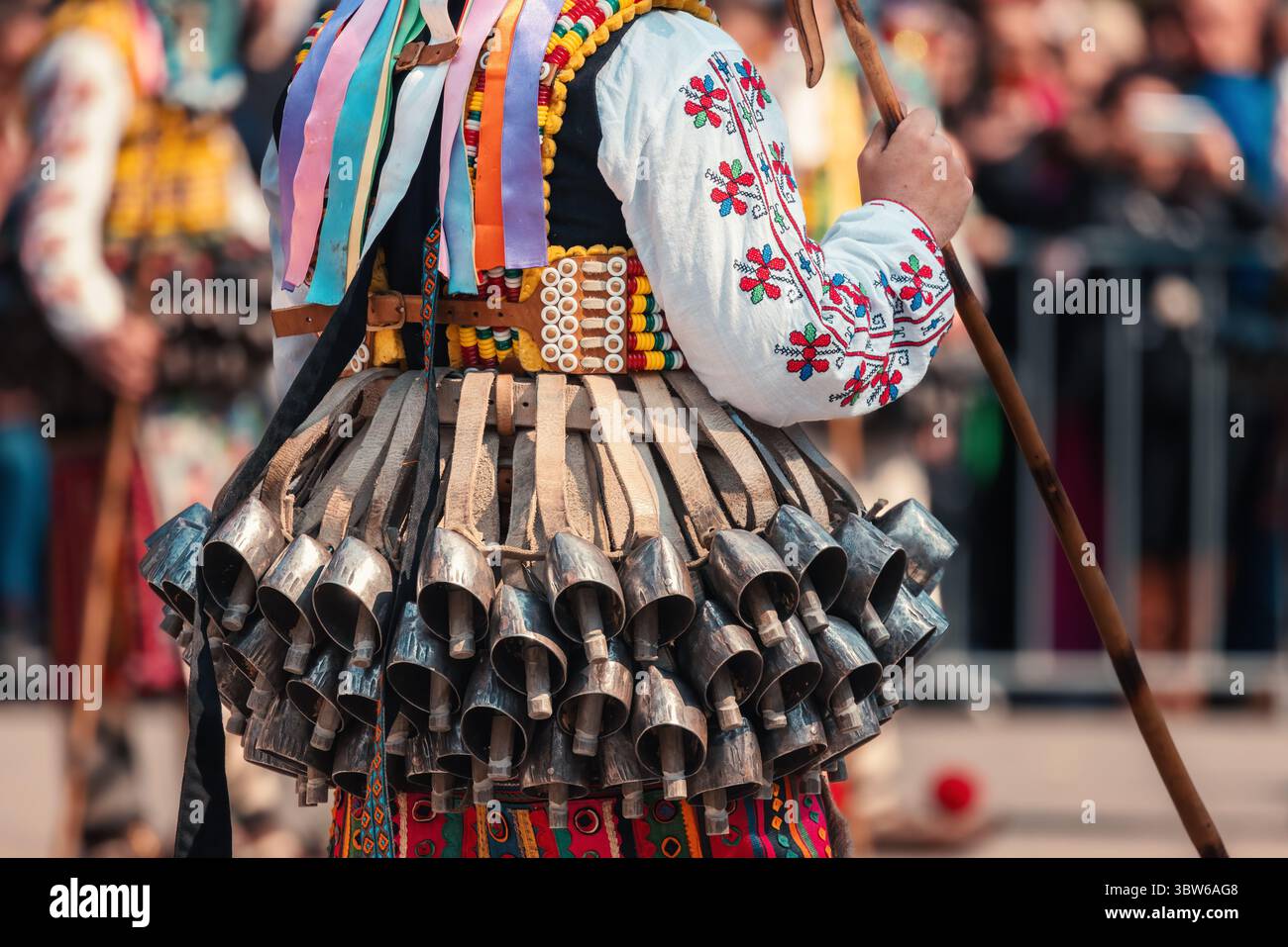 Bulgarian Kukeri with bells and traditional costumes, masked people ...