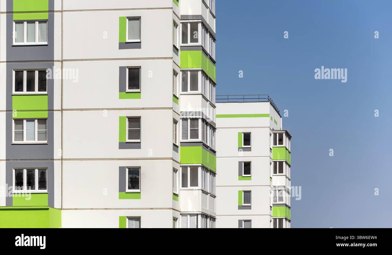 Wall facade and empty windows of new modern houses without people in ...