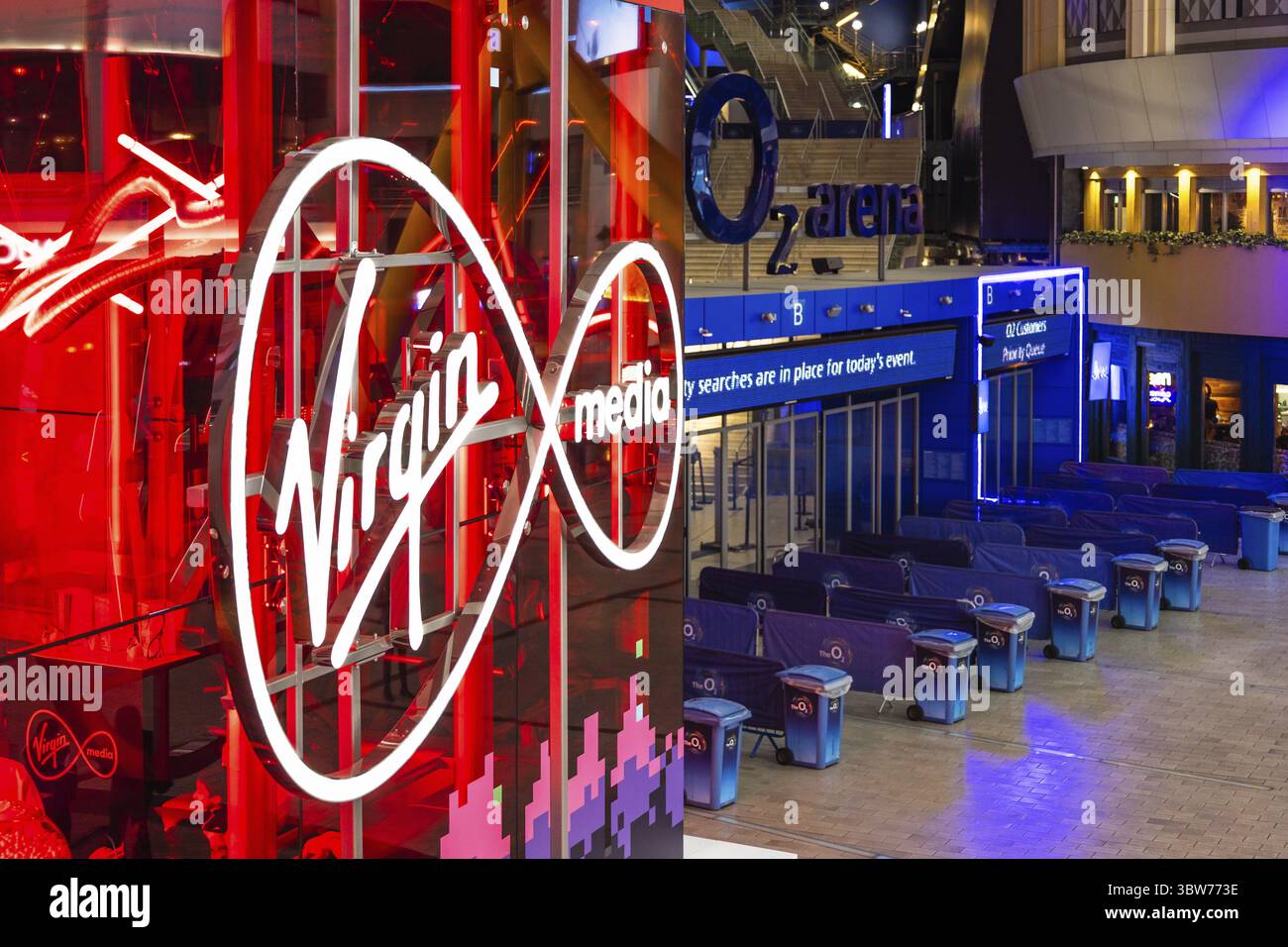 Virgin Media logo glows in neon lights at the entrance of the O2 Arena ...