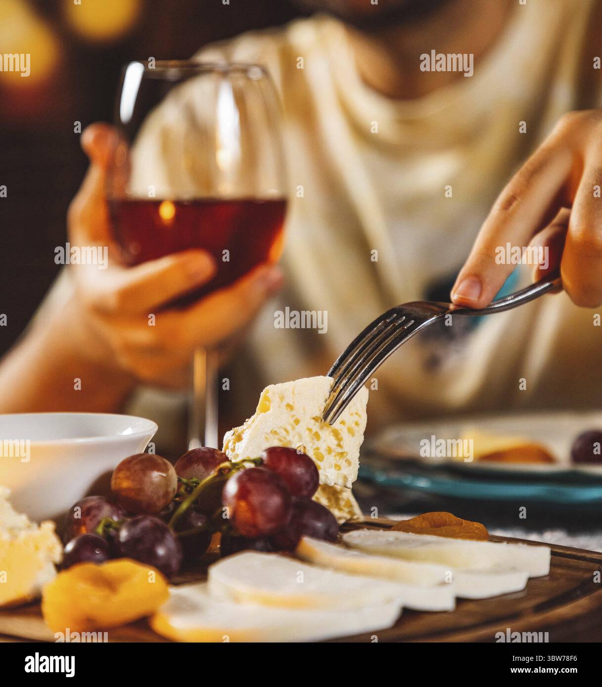 Fork holding piece cheese hi-res stock photography and images - Alamy