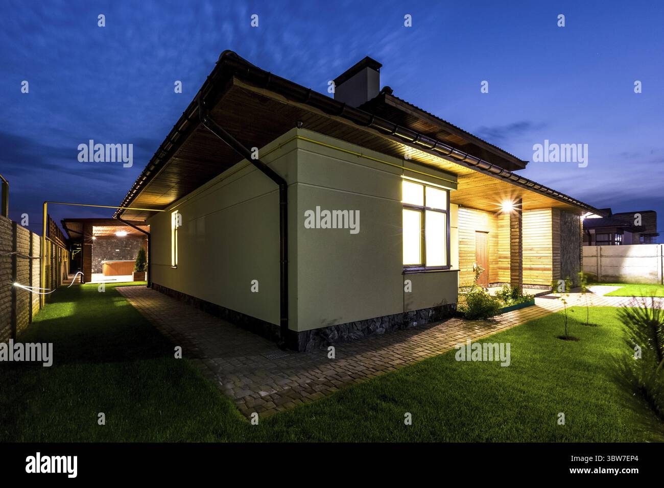 Detached luxury house at night - view from outside. Architecture modern ...