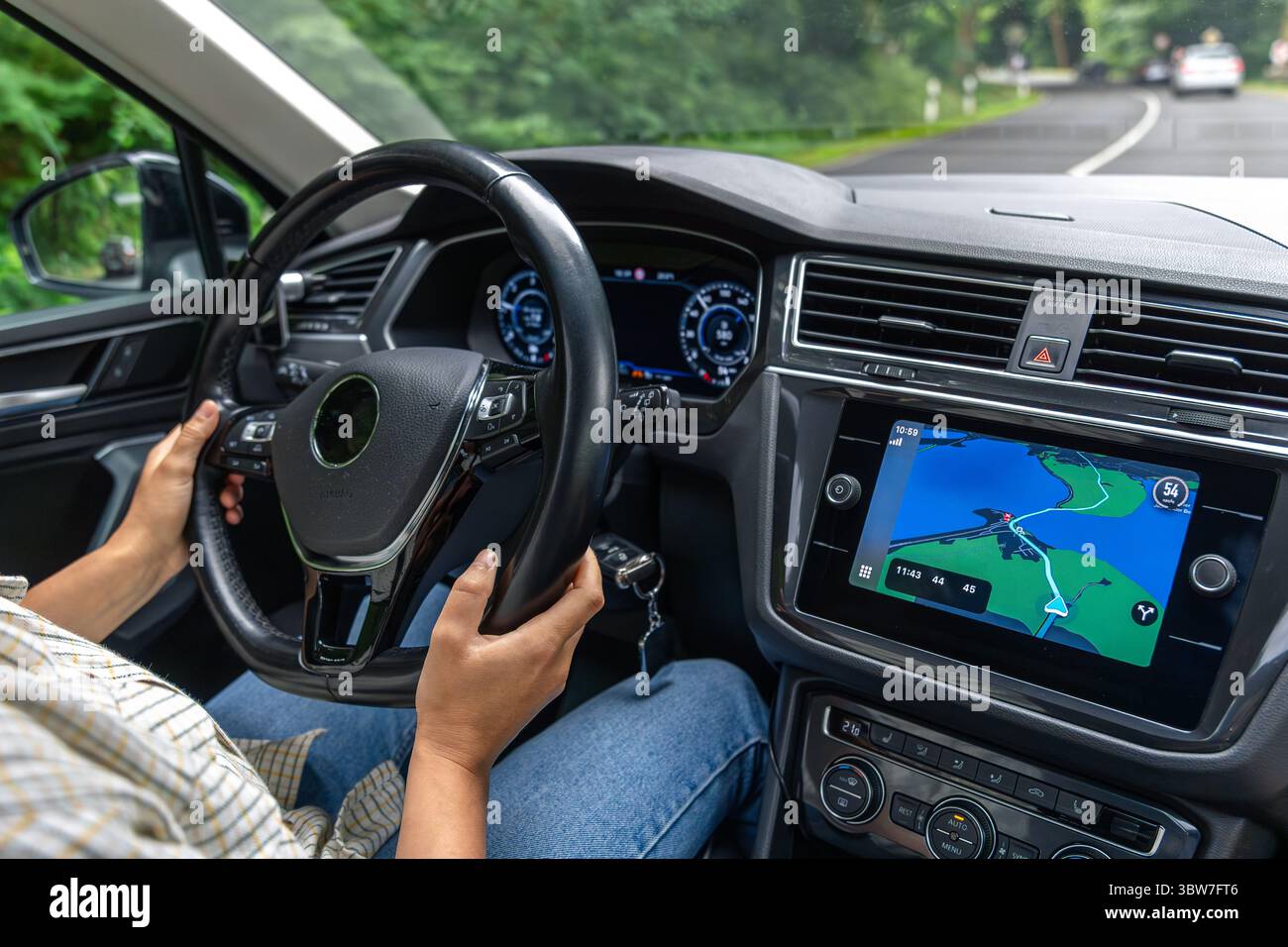 Woman driving car interior. Route on navigation. Travel driving concept ...