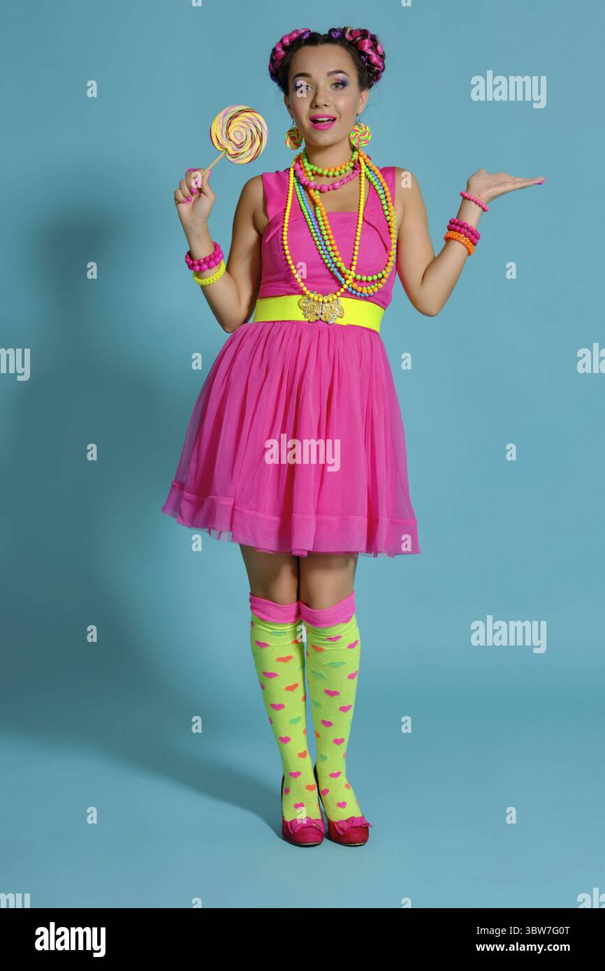 Full length photo of a beautiful maiden with a multi-colored braids ...