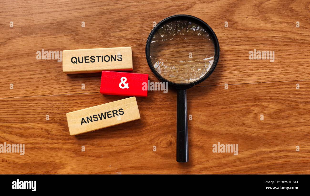 Questions and Answers with Magnifying Glass and Wooden Blocks Stock ...