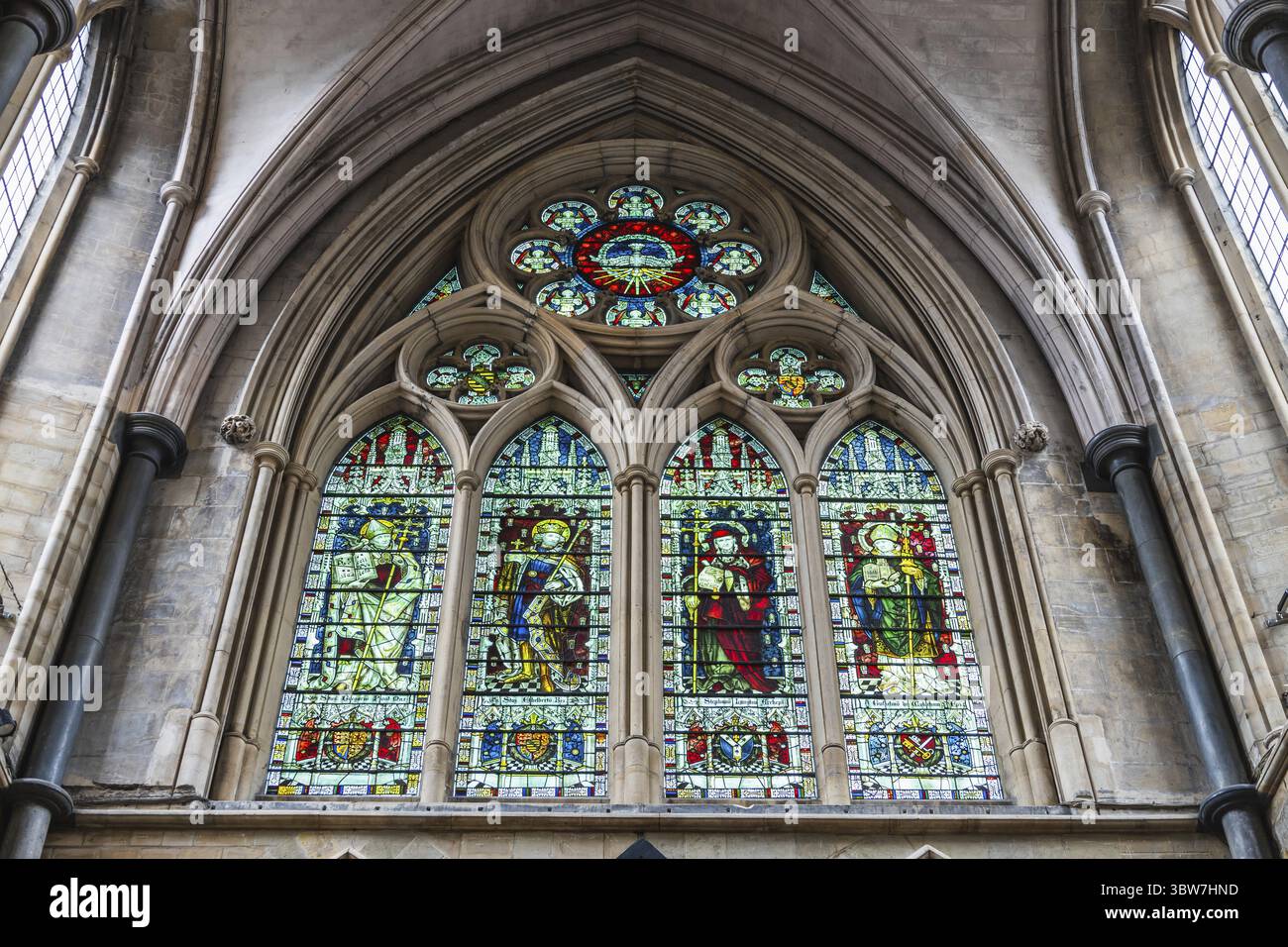 Intricate stained glass windows at Southwark Cathedral, showcasing Gothic architecture and vivid ...