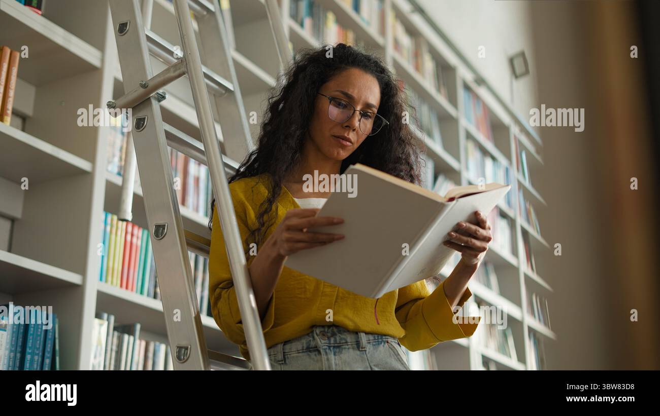 Latina Indian Hispanic woman female student high school university learning girl studying ...