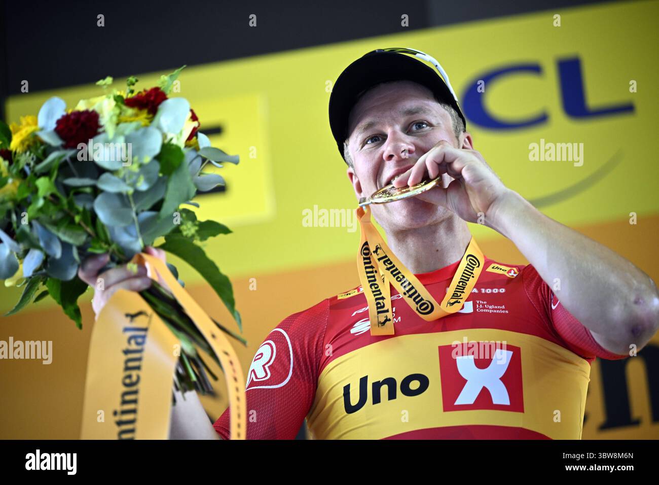Norwegian Jonas Abrahamsen of Uno-X Mobility celebrates on the podium ...