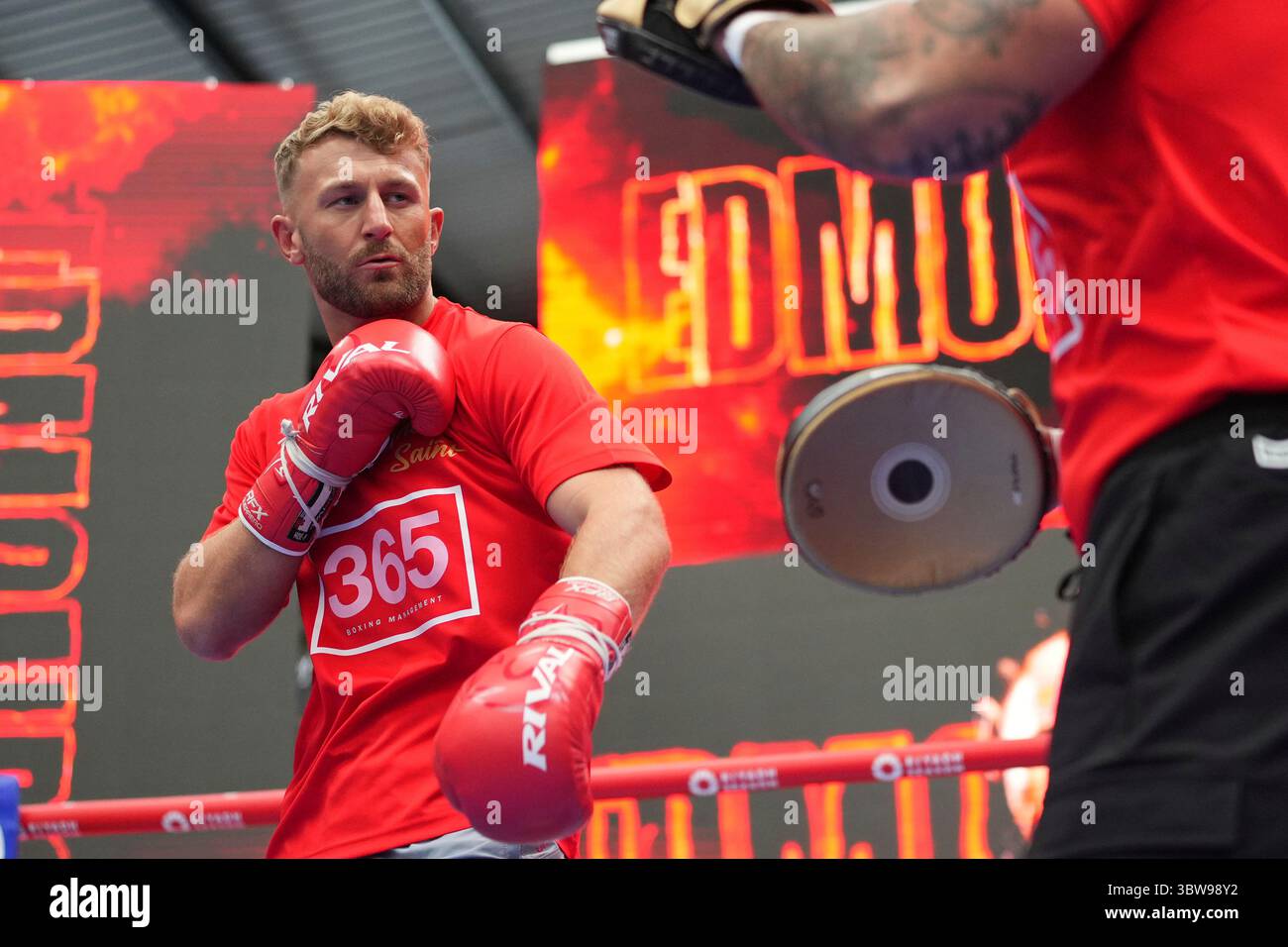 Britain's boxer Lewis Edmonson warms up during a public workout at ...