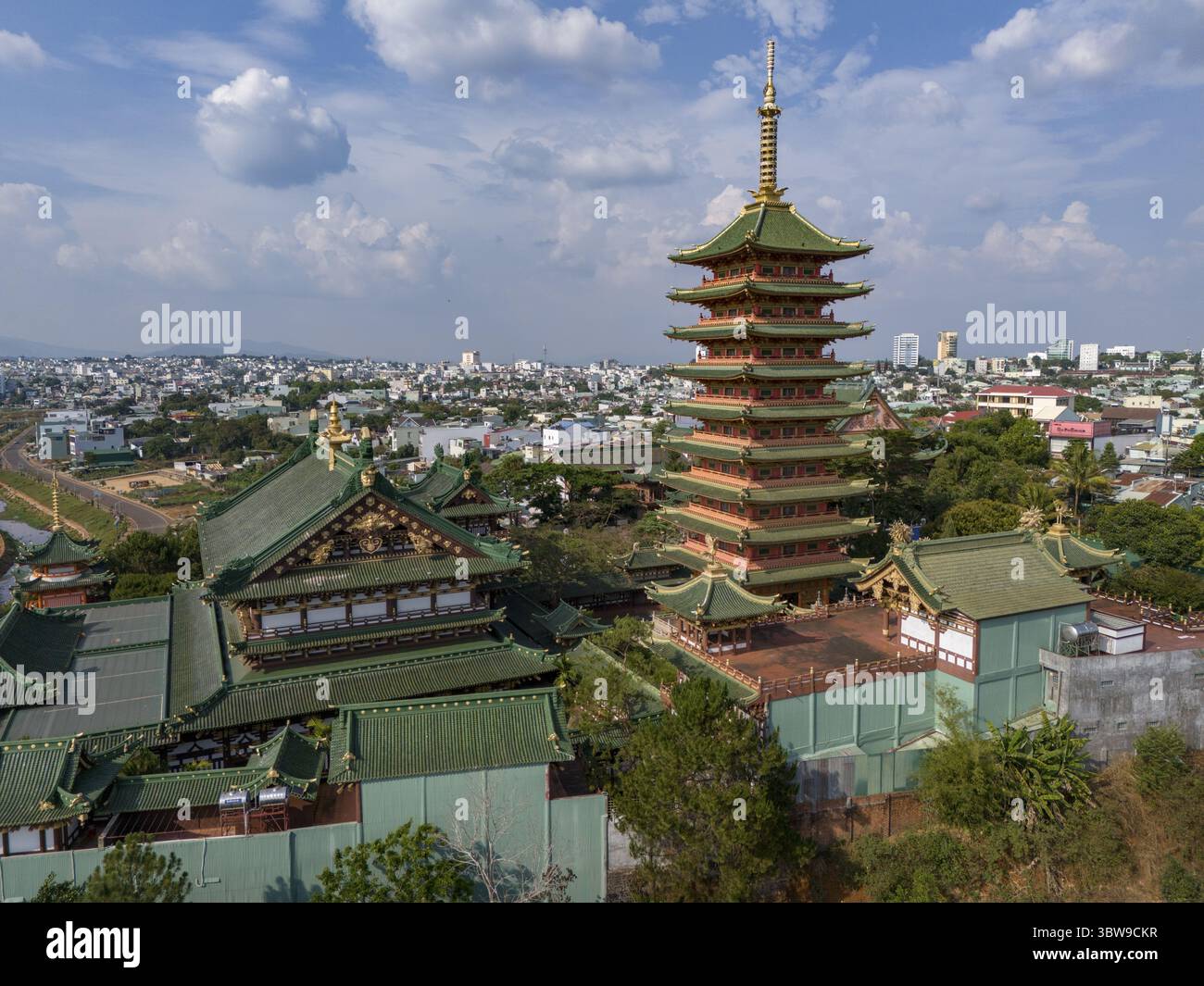 Aerial view of Minh Thanh Pagoda's tiered tower rising majestically ...