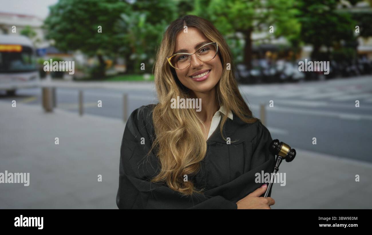 Woman in judge robe holds hi-res stock photography and images - Alamy